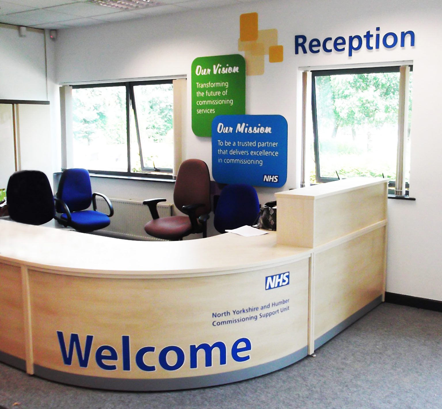 NHS-Reception-desk-corporate-branding-graphics - De-Signs Harrogate